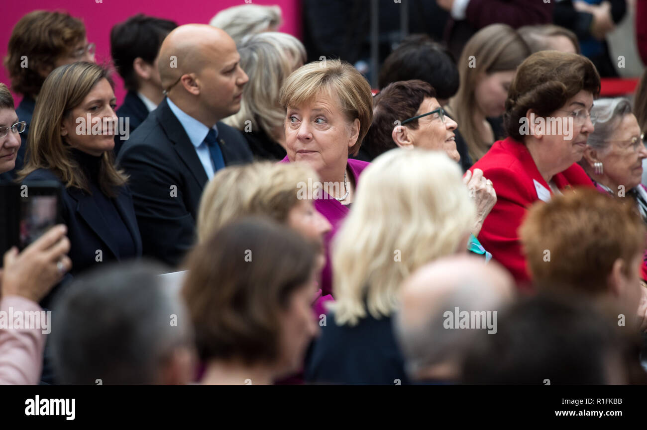 Berlin, Germany. 12th Nov, 2018. Chancellor Angela Merkel (CDU) sits in ...