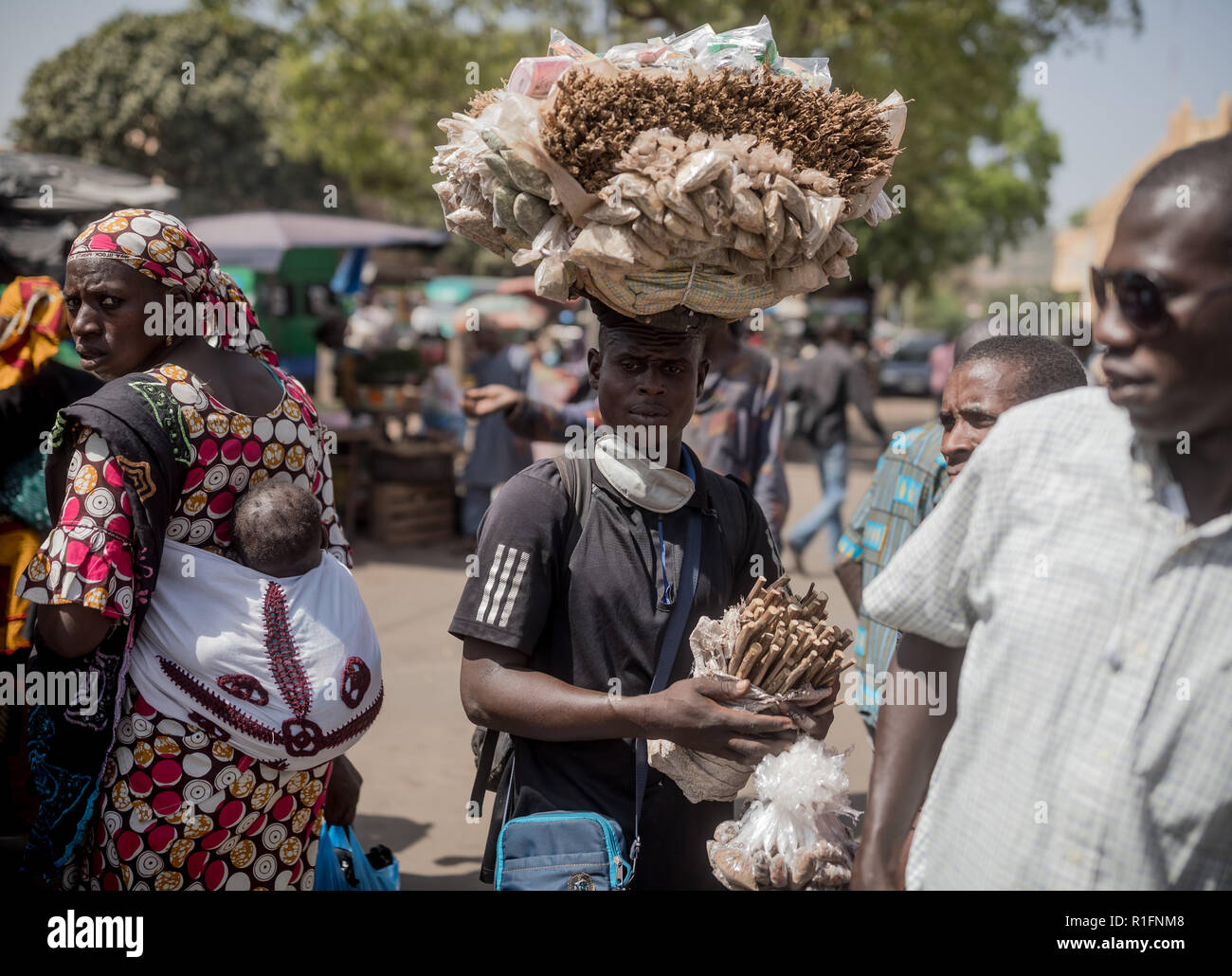 Bamako, Mali. 12th Nov, 2018. A street vendor offers snack bars in the ...