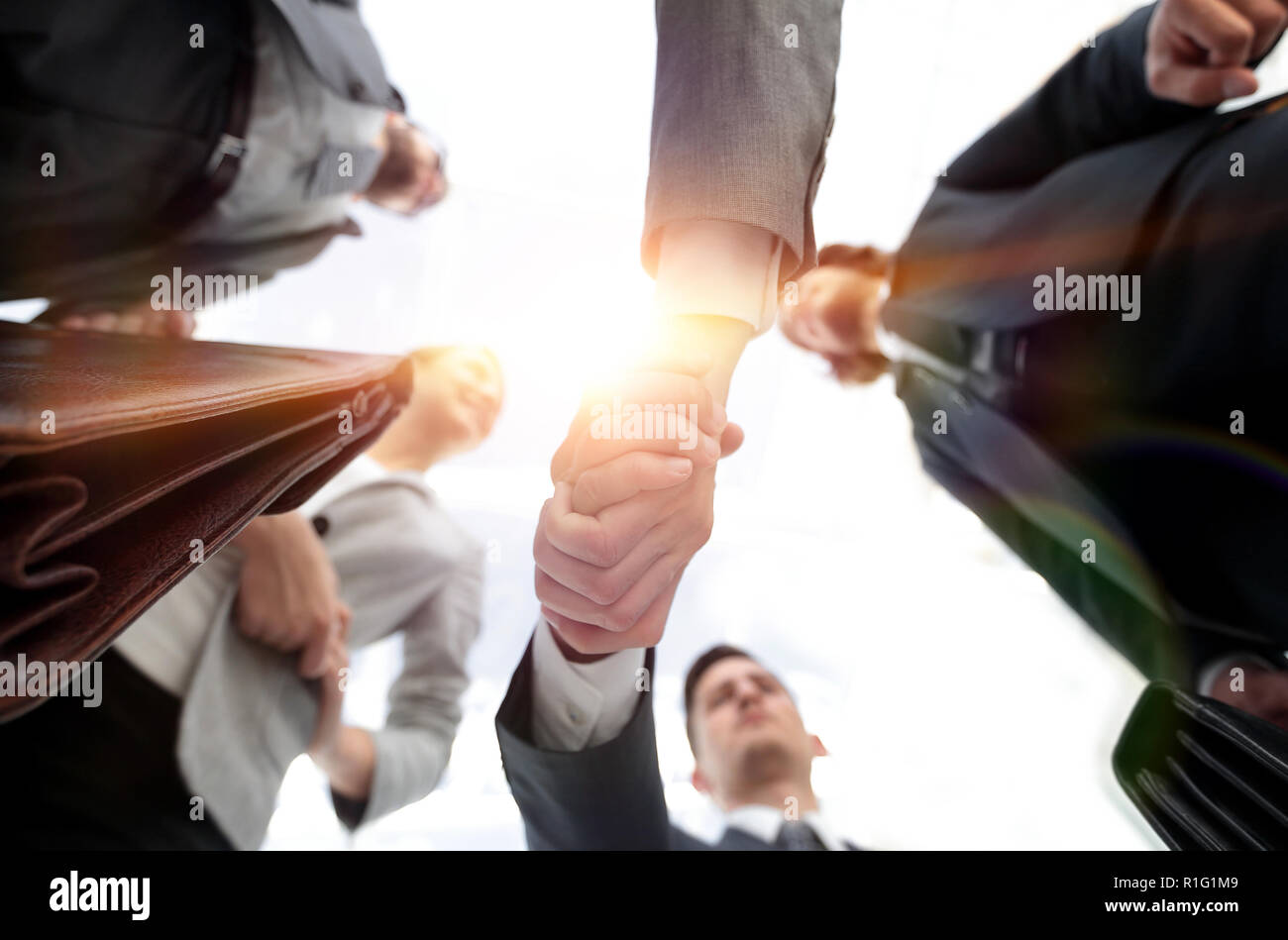 bottom view.business handshake Stock Photo - Alamy