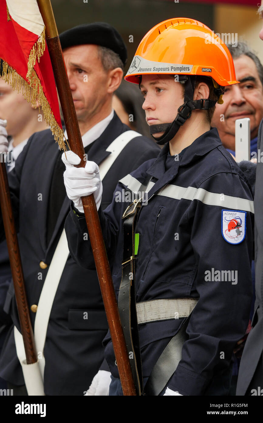 A Young firefighter cadet attends November 11th ceremony, Lyon, France ...