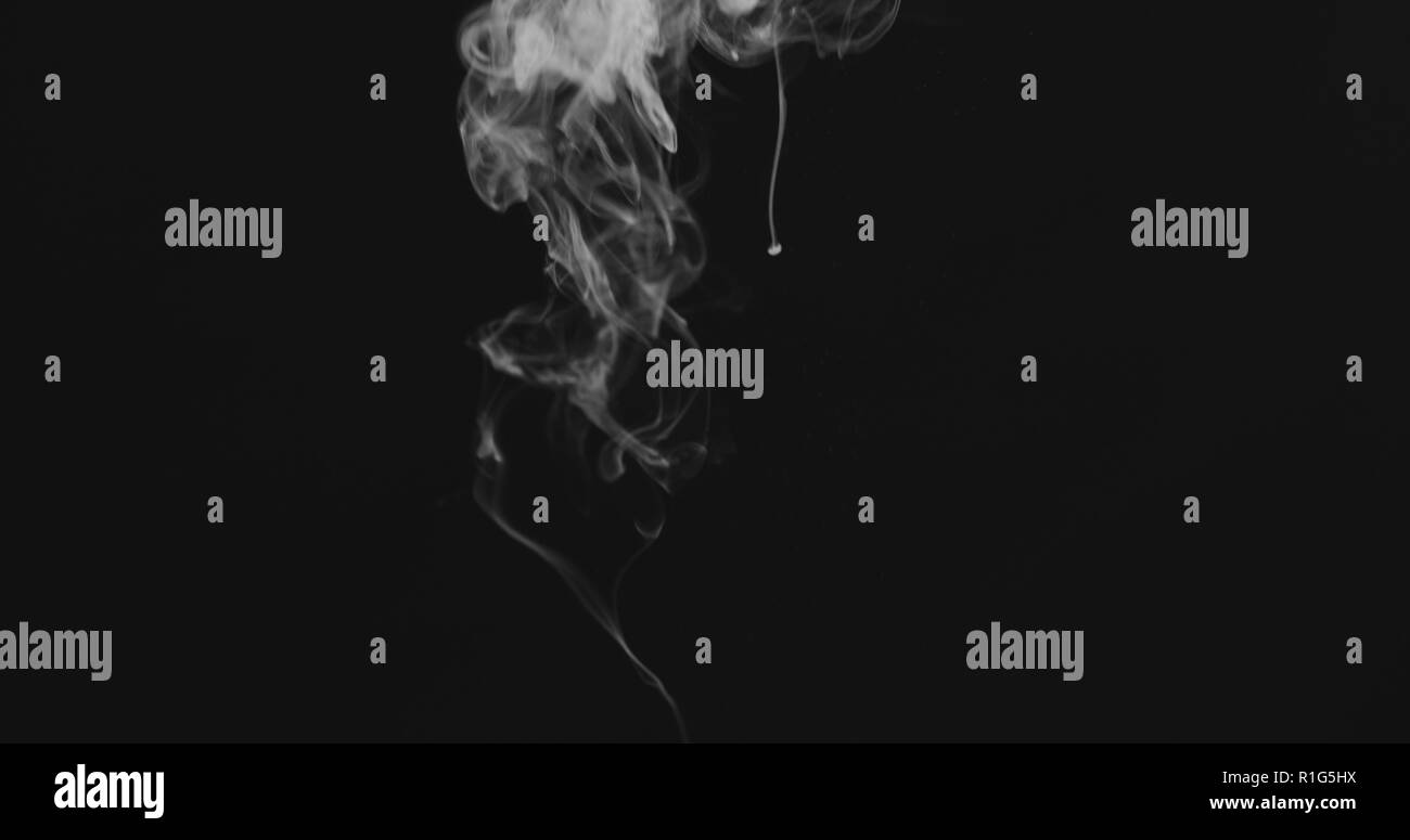 closeup vapor stream rises from bottom center on black background, wide ...