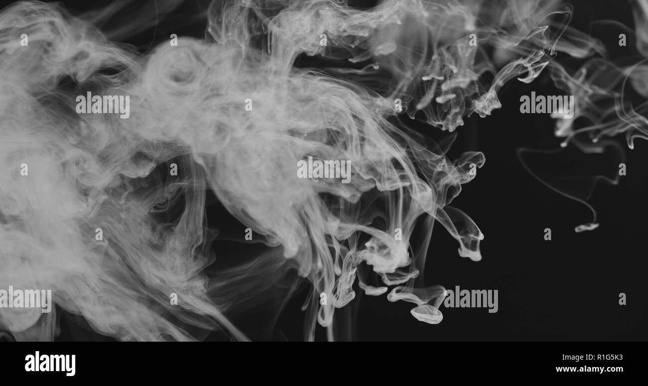 closeup vapor stream from right on black background, wide photo Stock ...