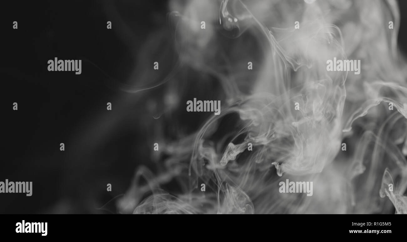 closeup vapor stream from top on black background, wide photo Stock ...