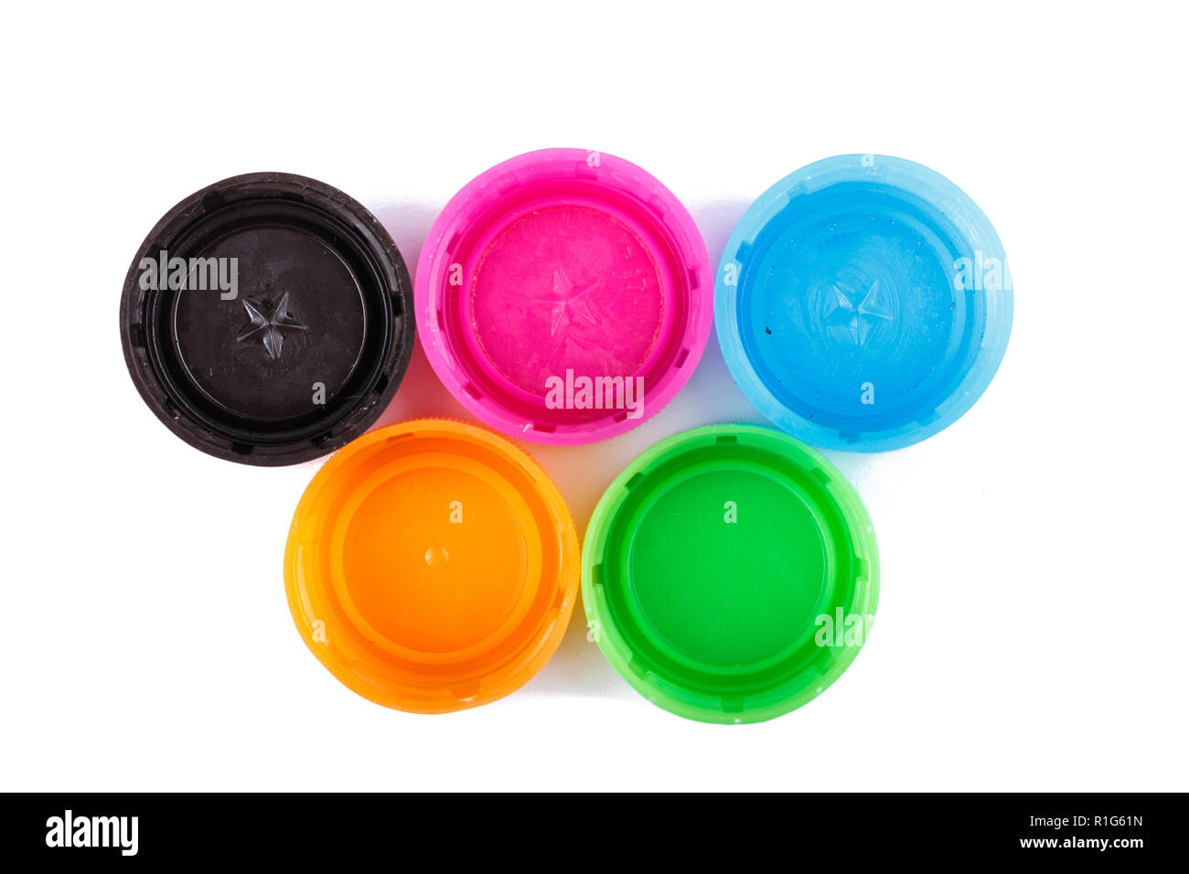 multicolored plastic bottle caps isolated on white background Stock ...