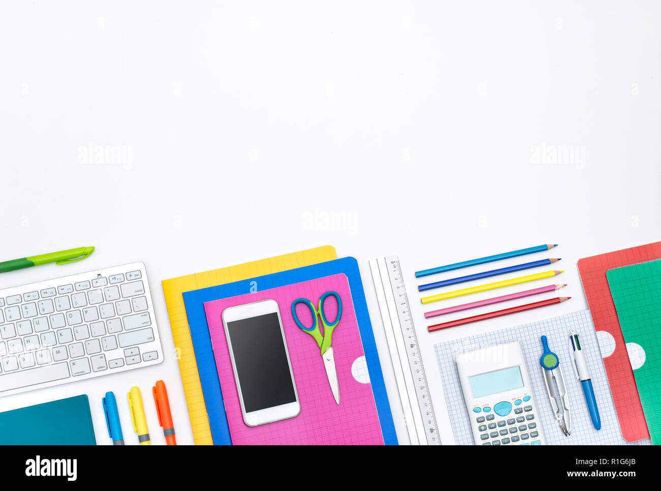 Back to school background header on white. Colorful school items ...