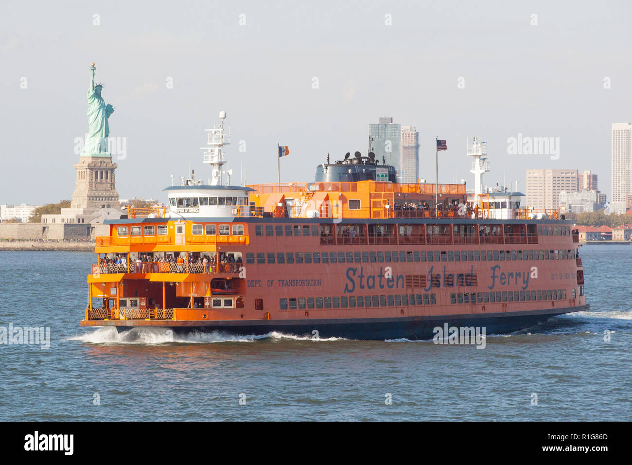 Staten Island Ferry with the Statue of Liberty in the Background, New ...