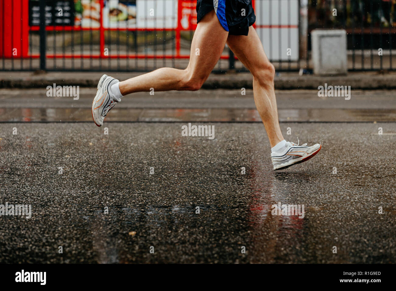 Shoes running in the rain hi-res stock photography and images - Alamy