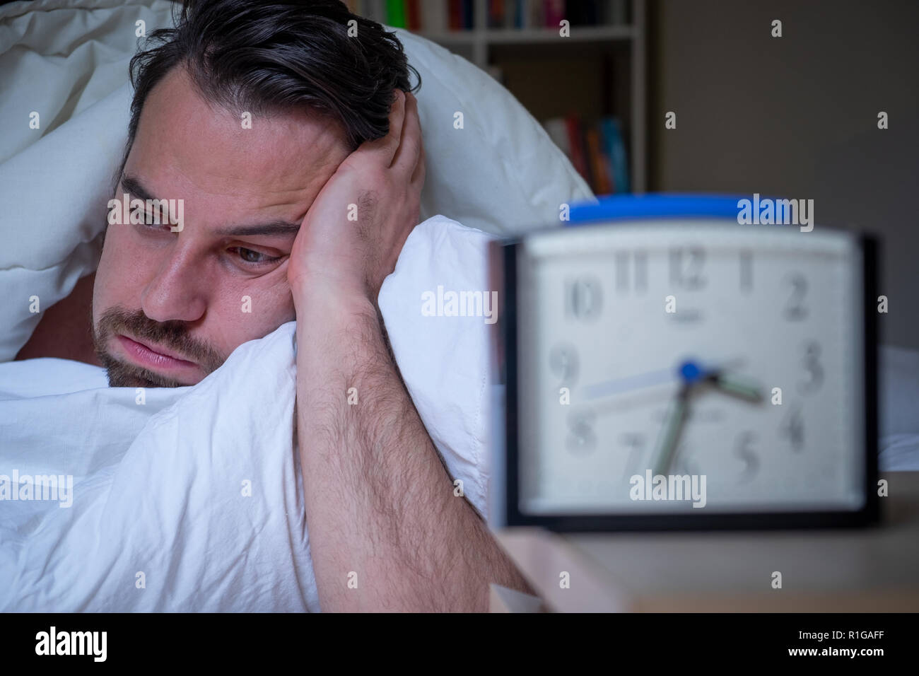 Man watching clock hi-res stock photography and images - Alamy