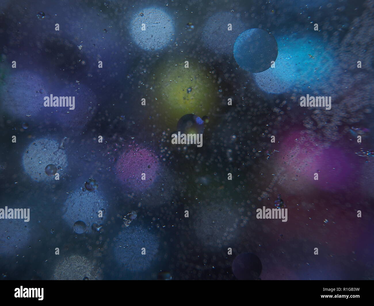 Abstract photography. Multi-colored circles. Drop of oil. Background ...