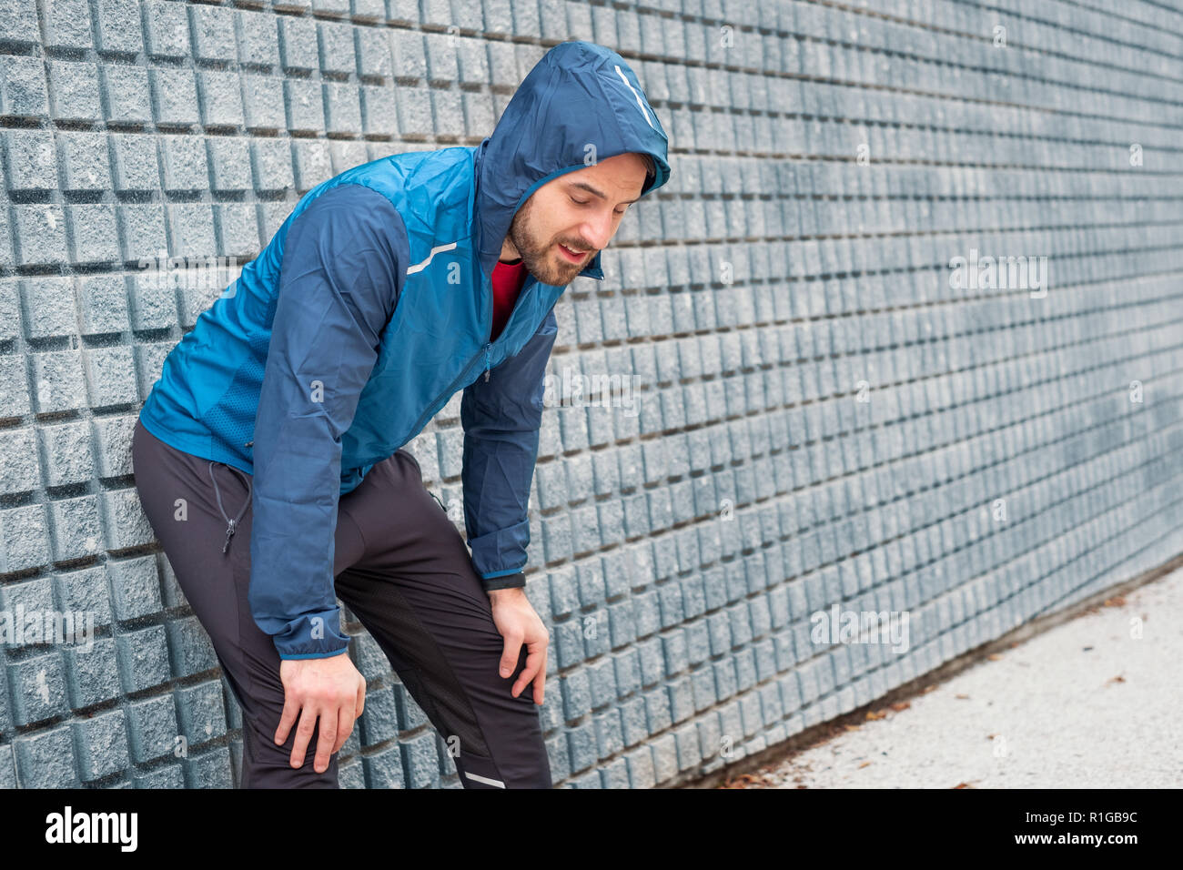 Jogging man tired hi-res stock photography and images - Alamy