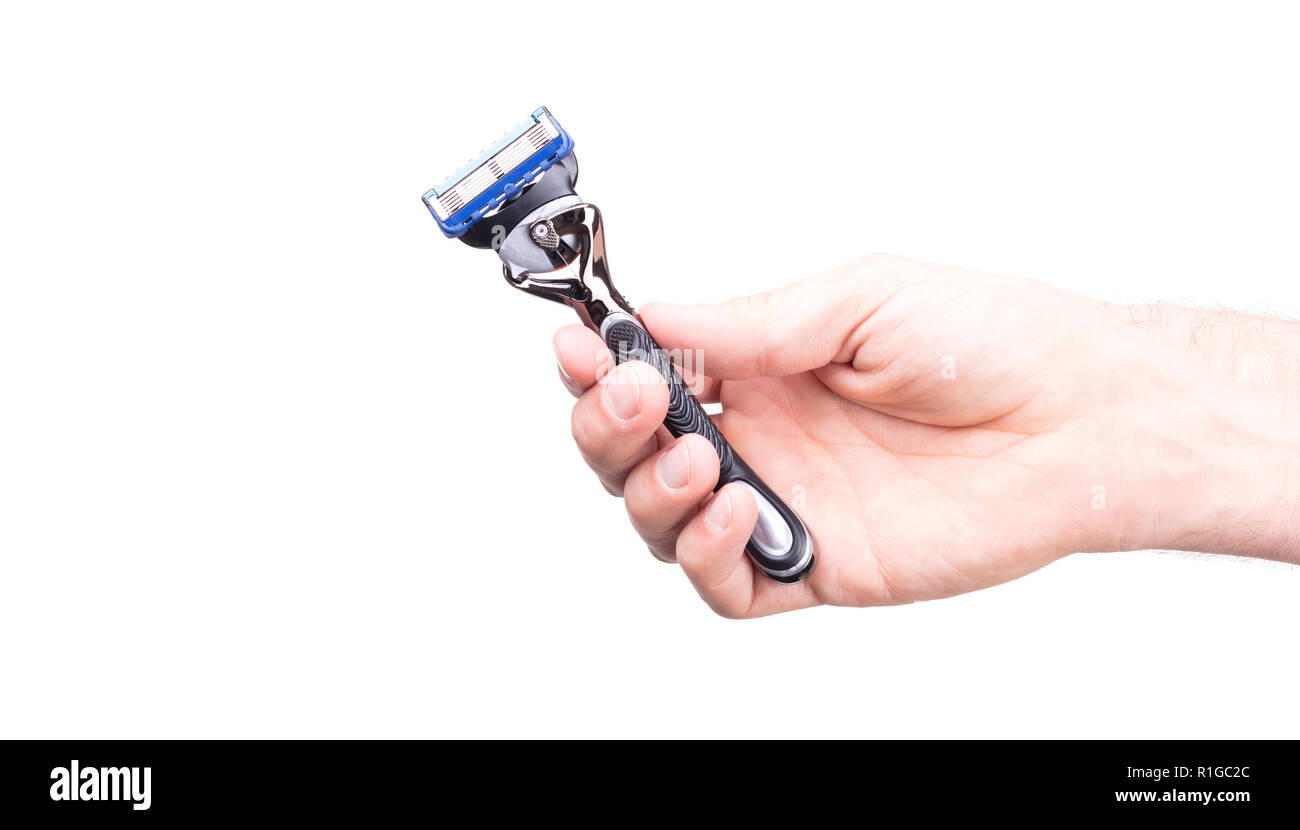 Modern razor isolated on a solid background Stock Photo - Alamy