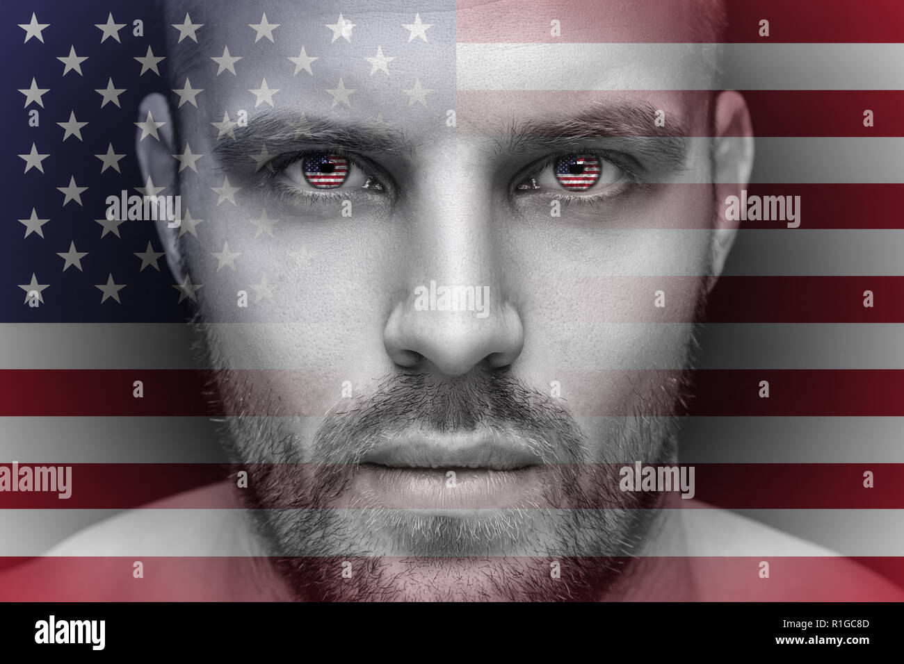 A portrait of a young serious man, in whose eyes is reflected the ...