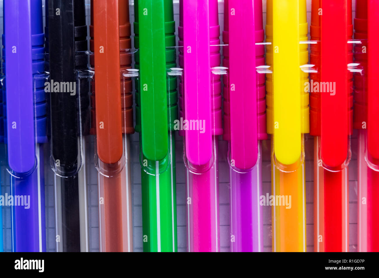 Colorful pens in a row. Education abstract concept Stock Photo - Alamy