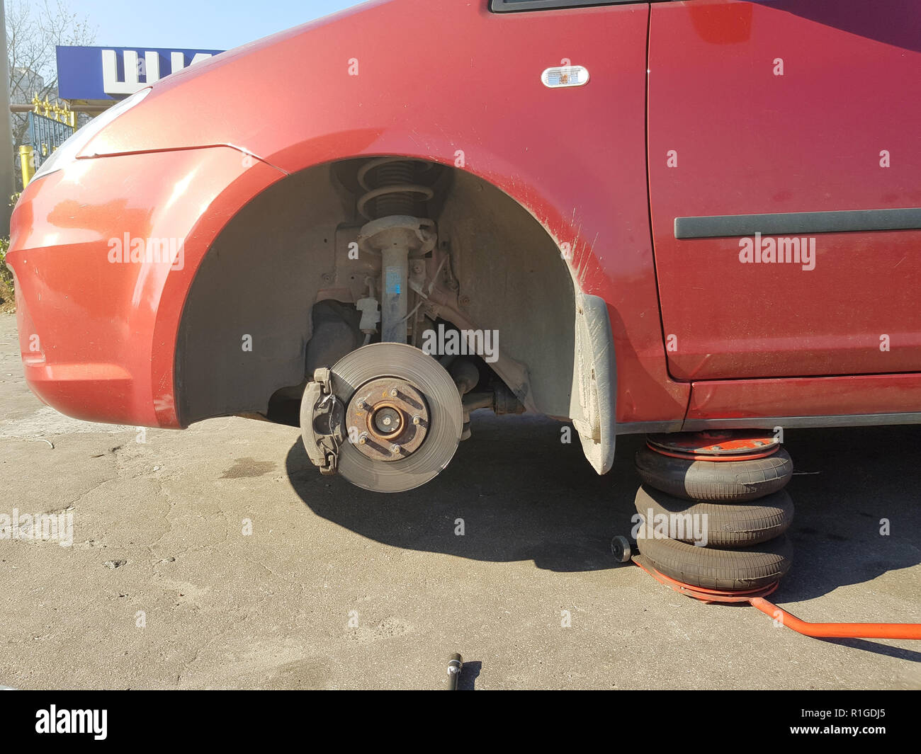 car brake part at garage,car brake disc without wheels closeup Stock ...