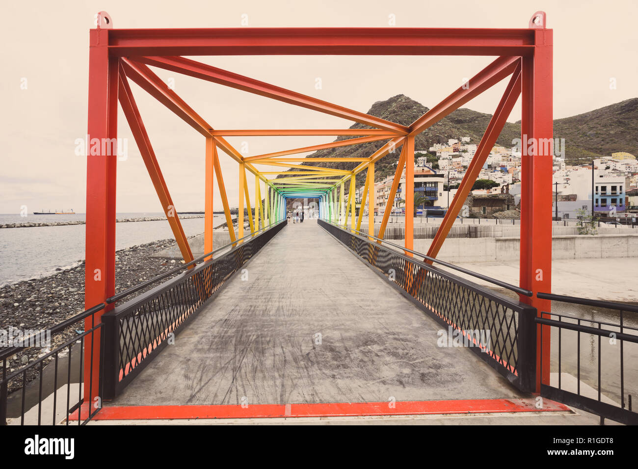 Rainbow colored steel bridge on Tenerife island Stock Photo - Alamy