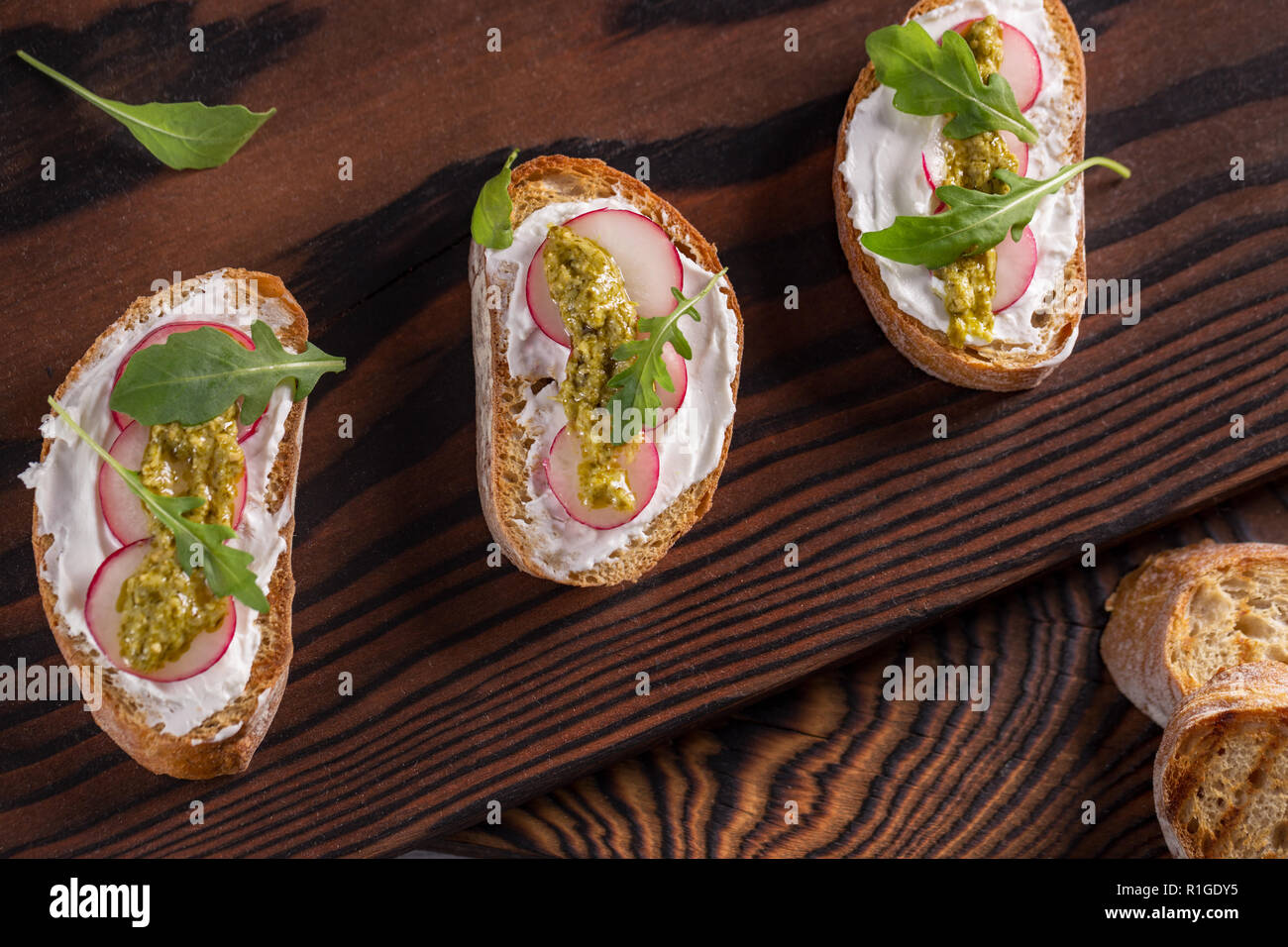 Fresh and crispy Italian snack like bruschetta or crostini Stock Photo ...