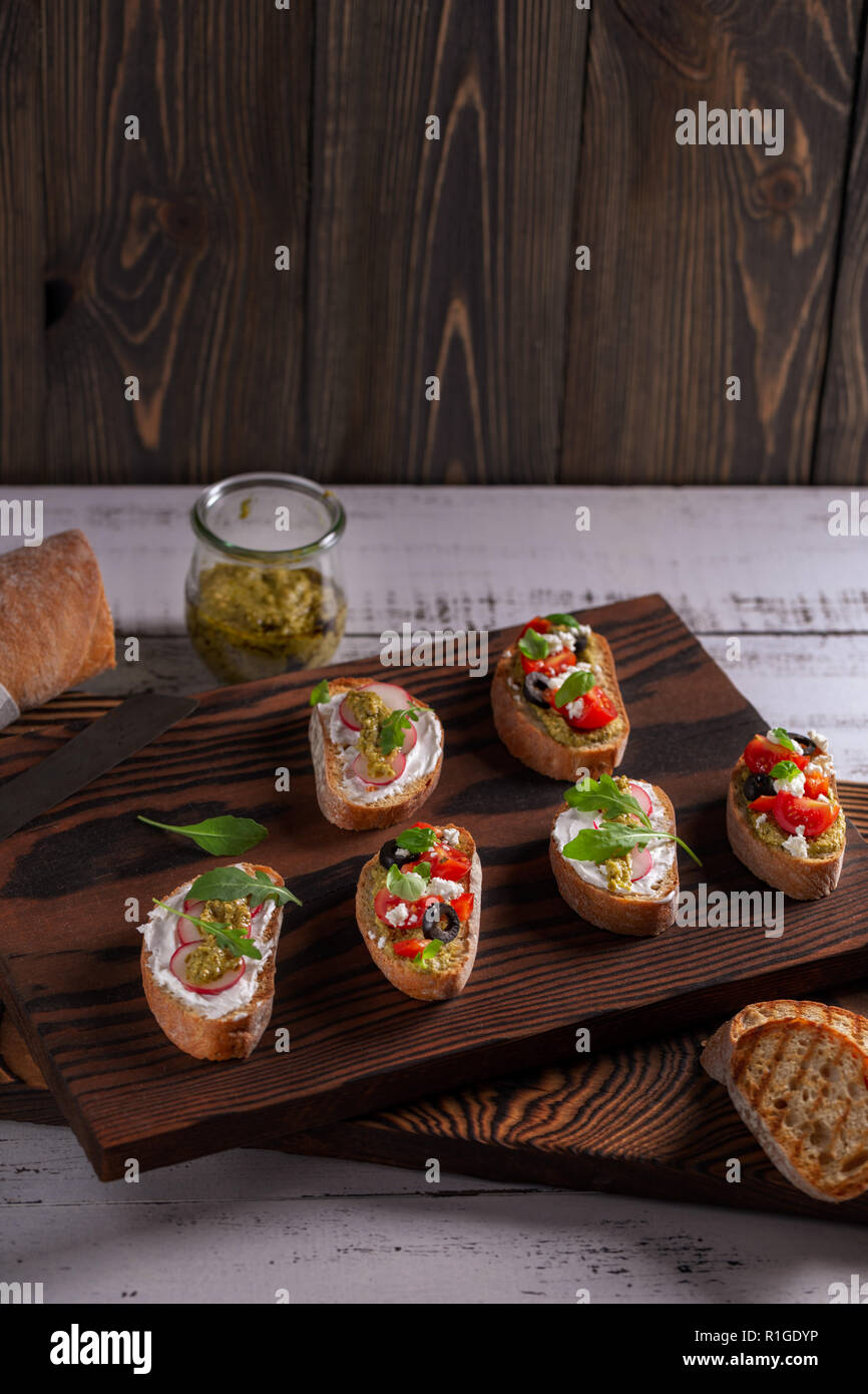 Fresh and crispy Italian snack like bruschetta or crostini Stock Photo ...