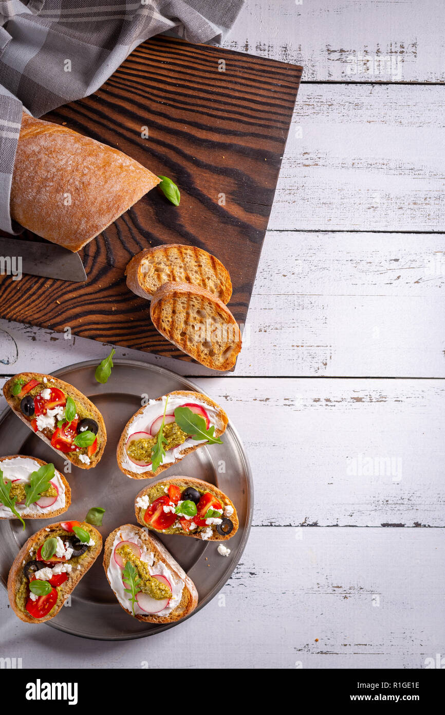 Fresh and crispy Italian snack like bruschetta or crostini Stock Photo ...