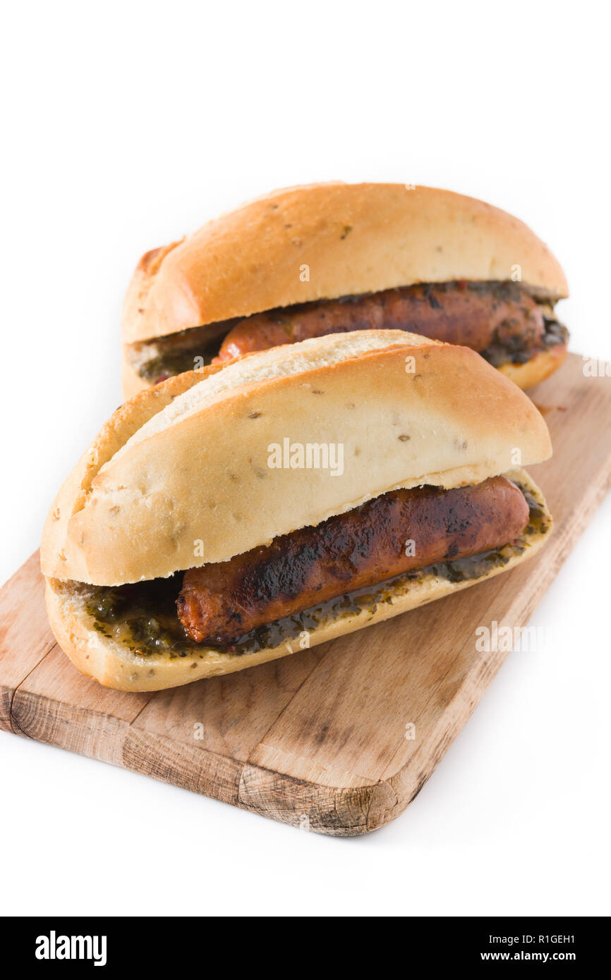 Choripan. Traditional Argentina sandwich with chorizo and chimichurri ...