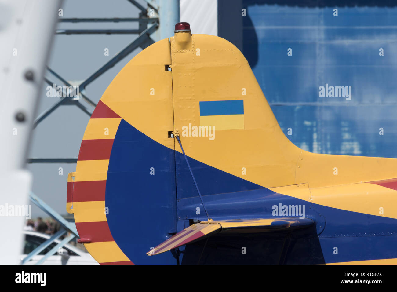 Empennage of the training aircraft with Ukraine blue-yellow flag on the ...