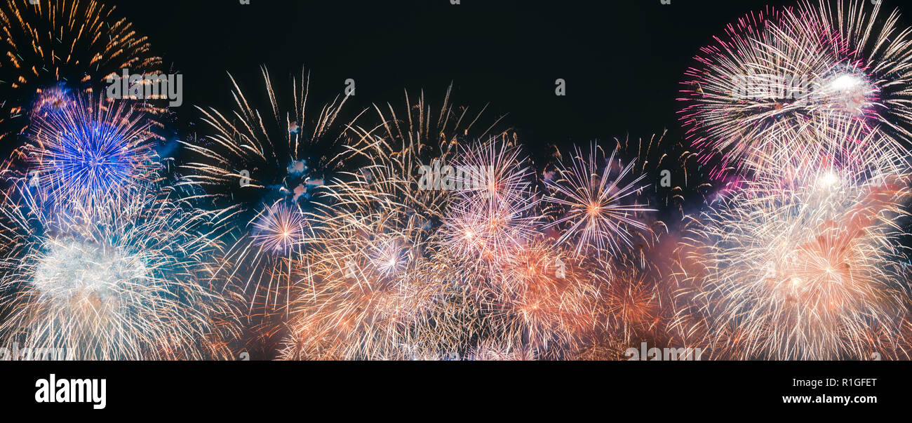 Colorful fireworks explosion on the black background Stock Photo - Alamy