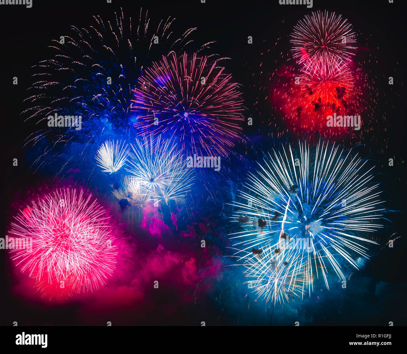 Colorful fireworks explosion on the black background Stock Photo - Alamy