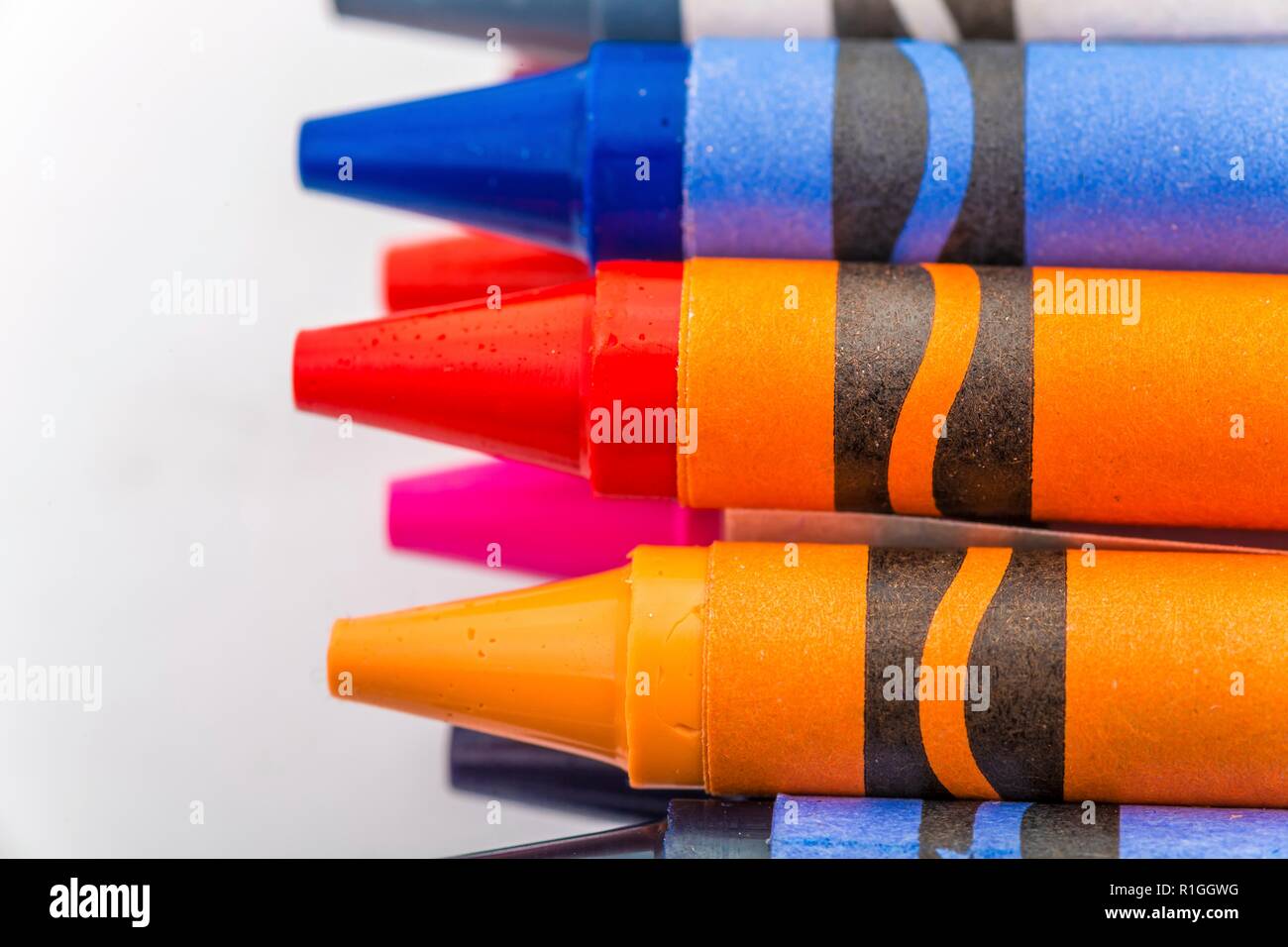 Different Colored Crayons on a White Background Stock Photo - Alamy