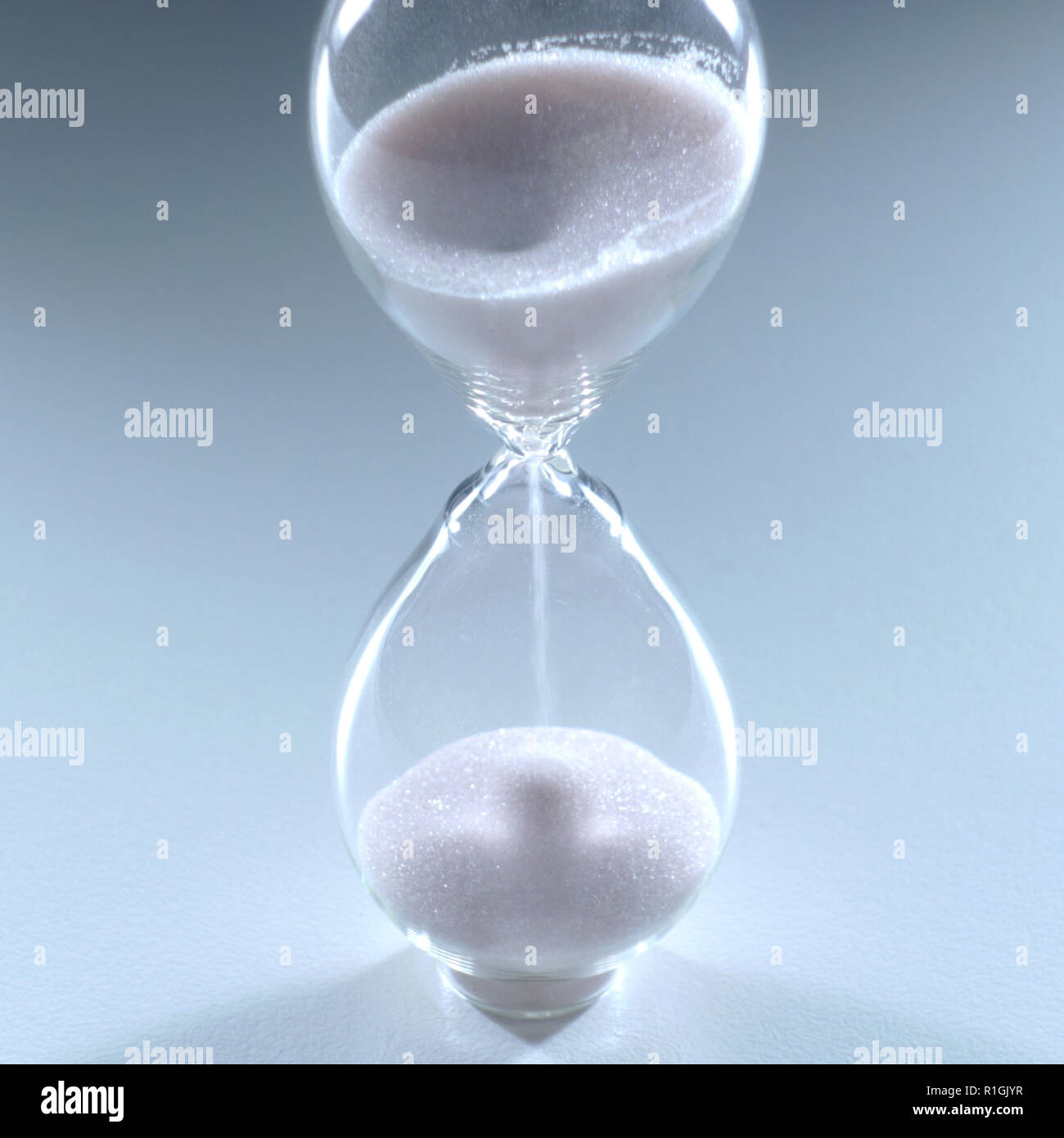 Photo of a isolated hourglass: an ancient clock, an instrument for ...