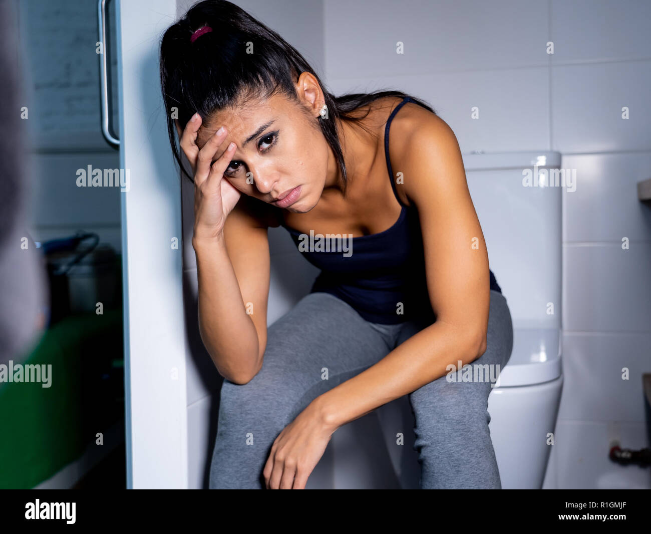 Woman desperate toilet hi-res stock photography and images - Alamy