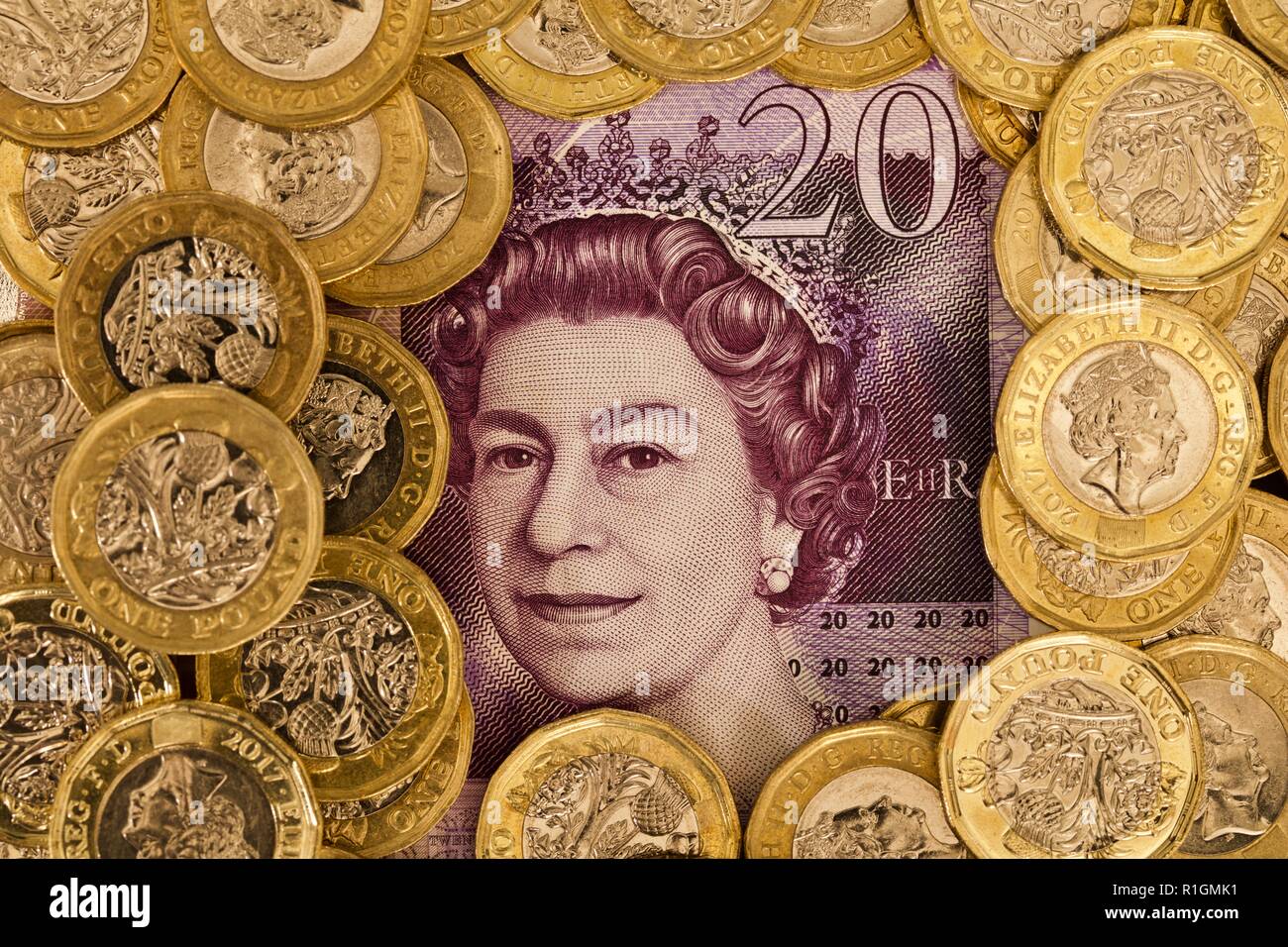British English Currency Coins And Banknote UK Sterling Stock Photo british-english-currency-coins-and-banknote-uk-sterling-stock-photo