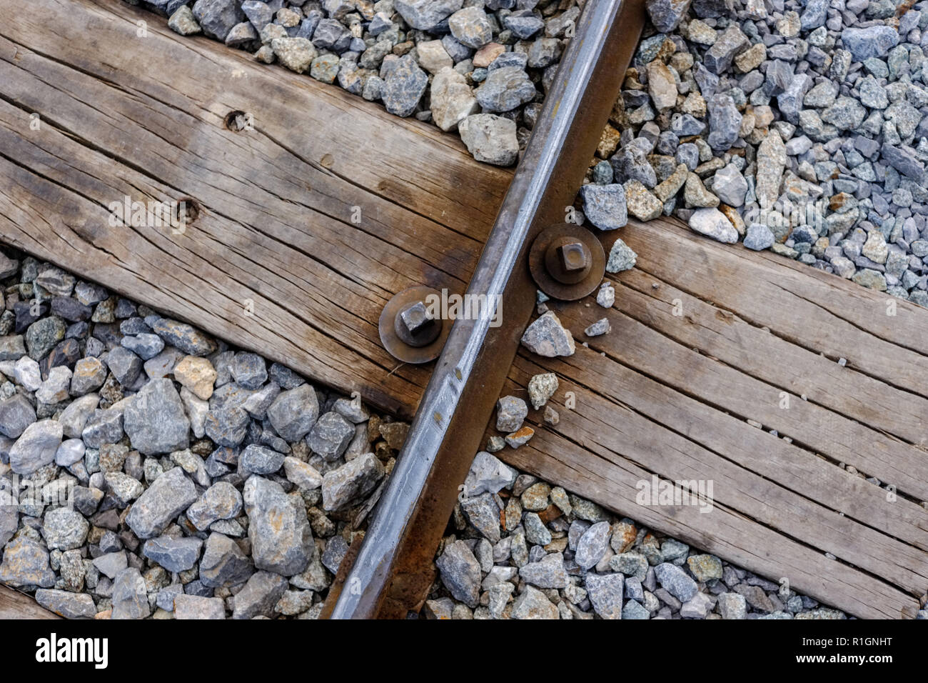 ancient log wood railway and train on the tracks. tourist attraction ...