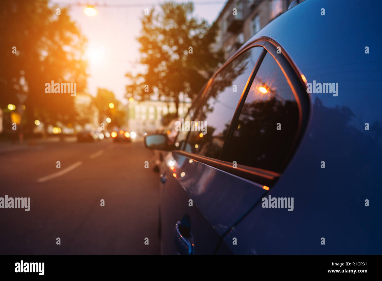 The side mirror and the window reflect the street Stock Photo - Alamy