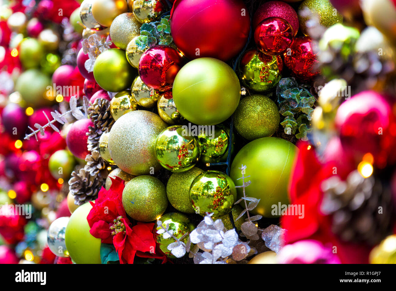 Christmas baubles and decorations in red and green background Stock ...