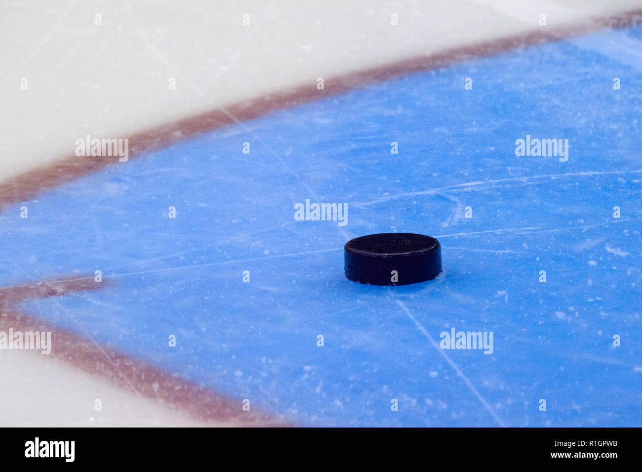 Hockey Puck Sliding On Ice
