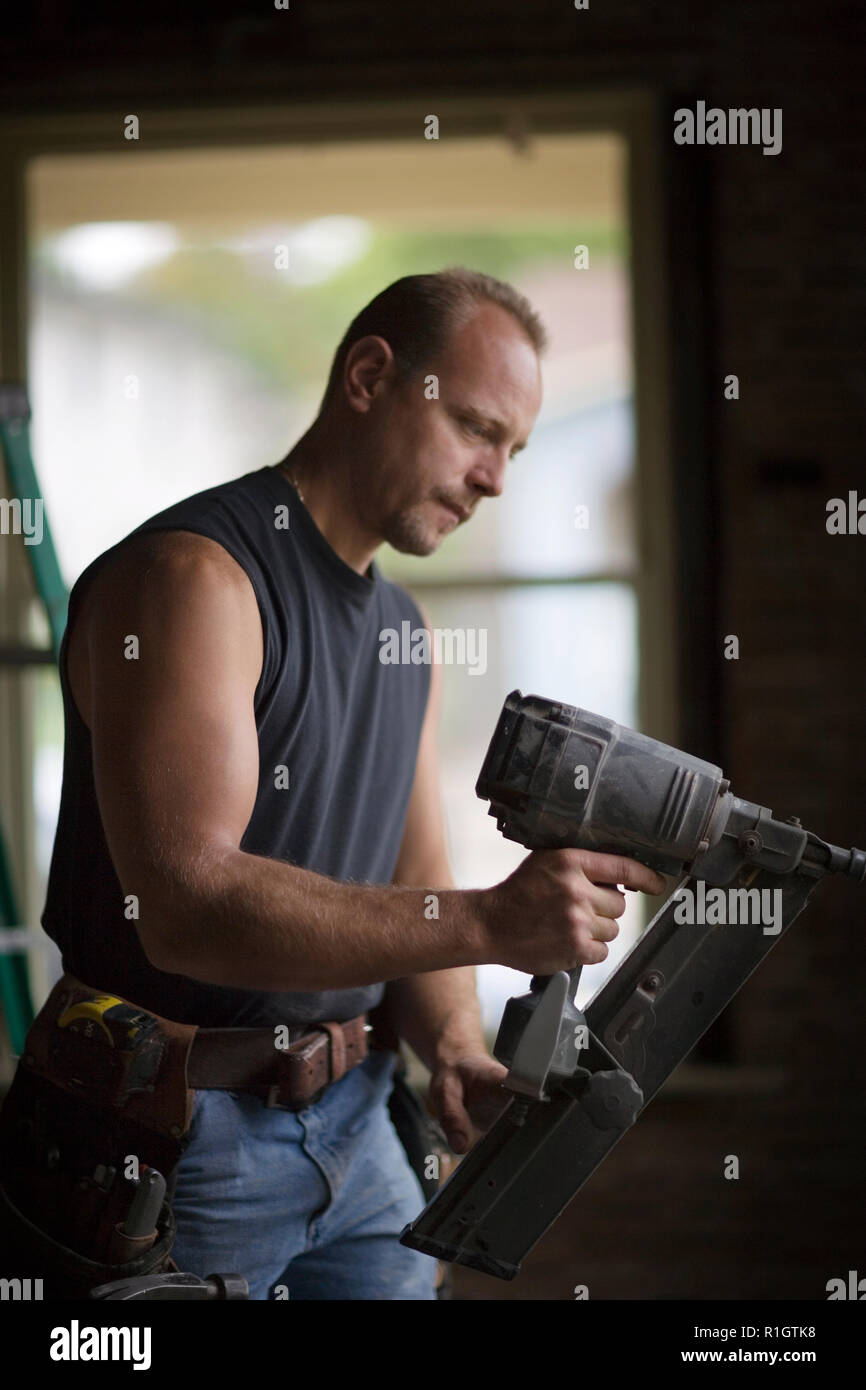 Side profile man holding gun hi-res stock photography and images - Alamy
