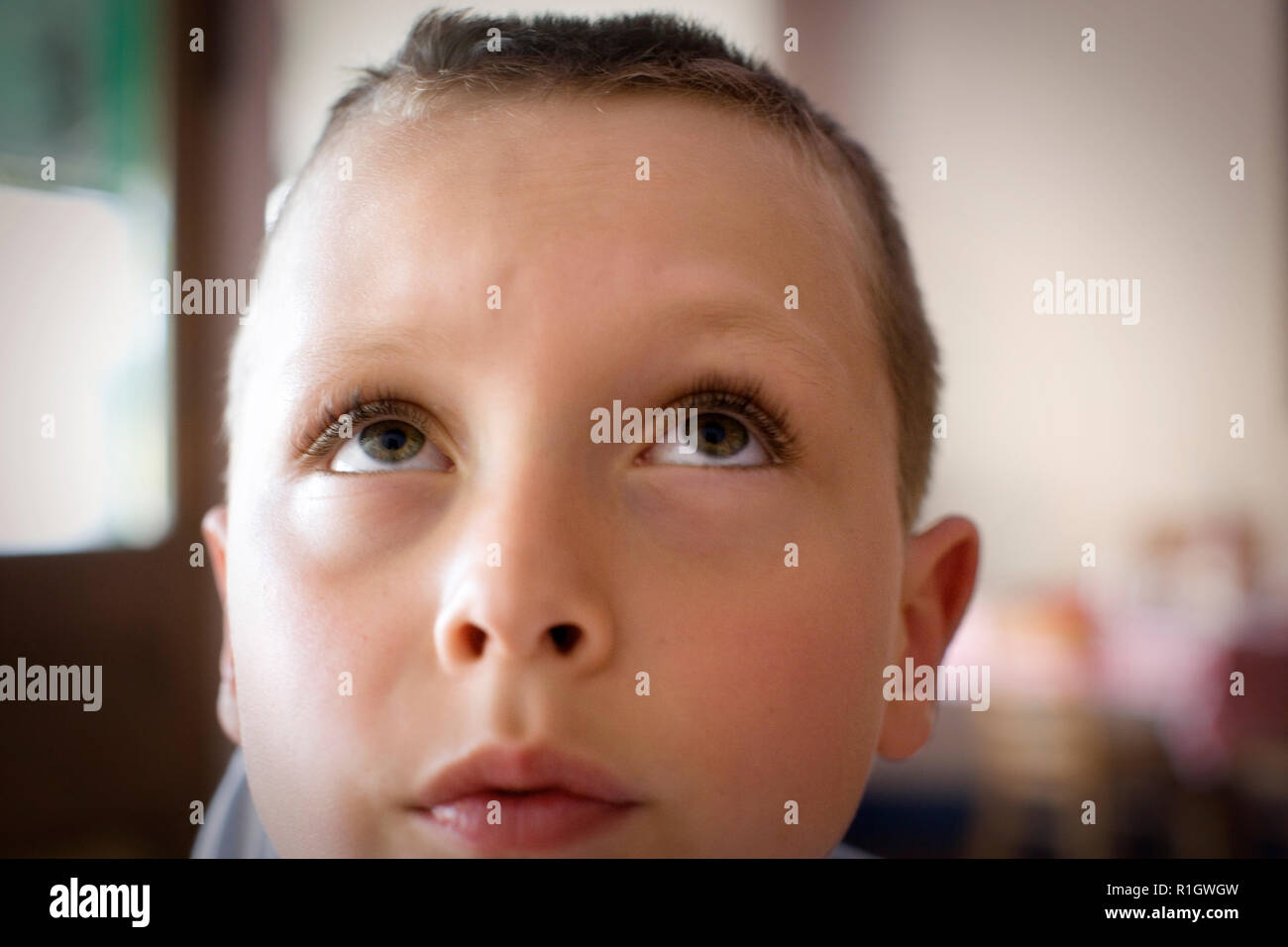 Tween boy pensive hi-res stock photography and images - Alamy