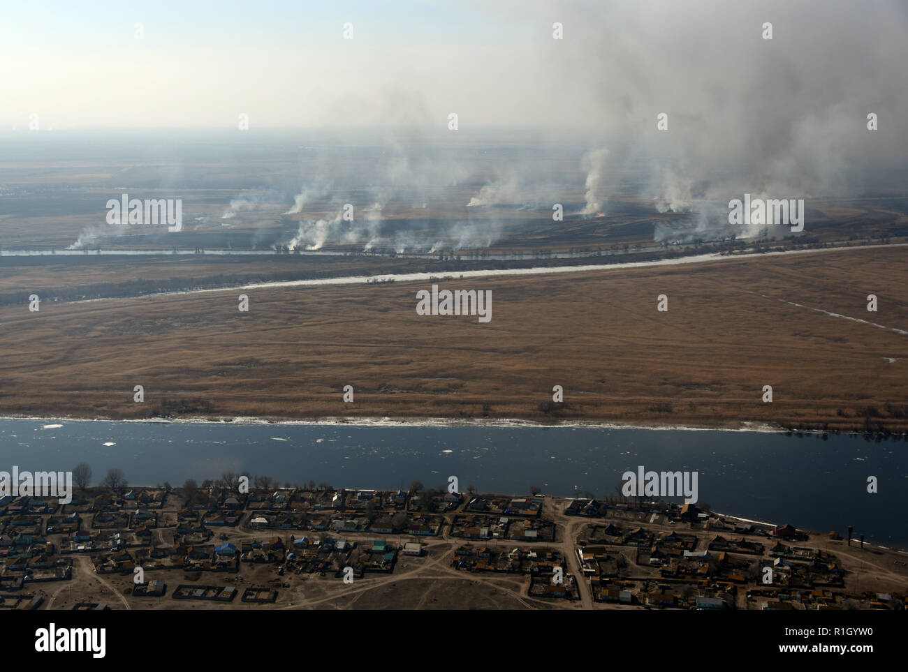 The wildfire or wildland fire in the steppe area of the Volga Delta ...