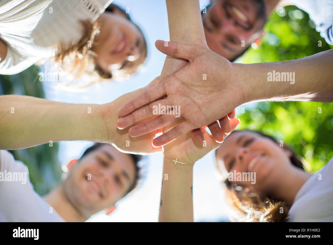 Friends comforting one another and make a promise Stock Photo - Alamy