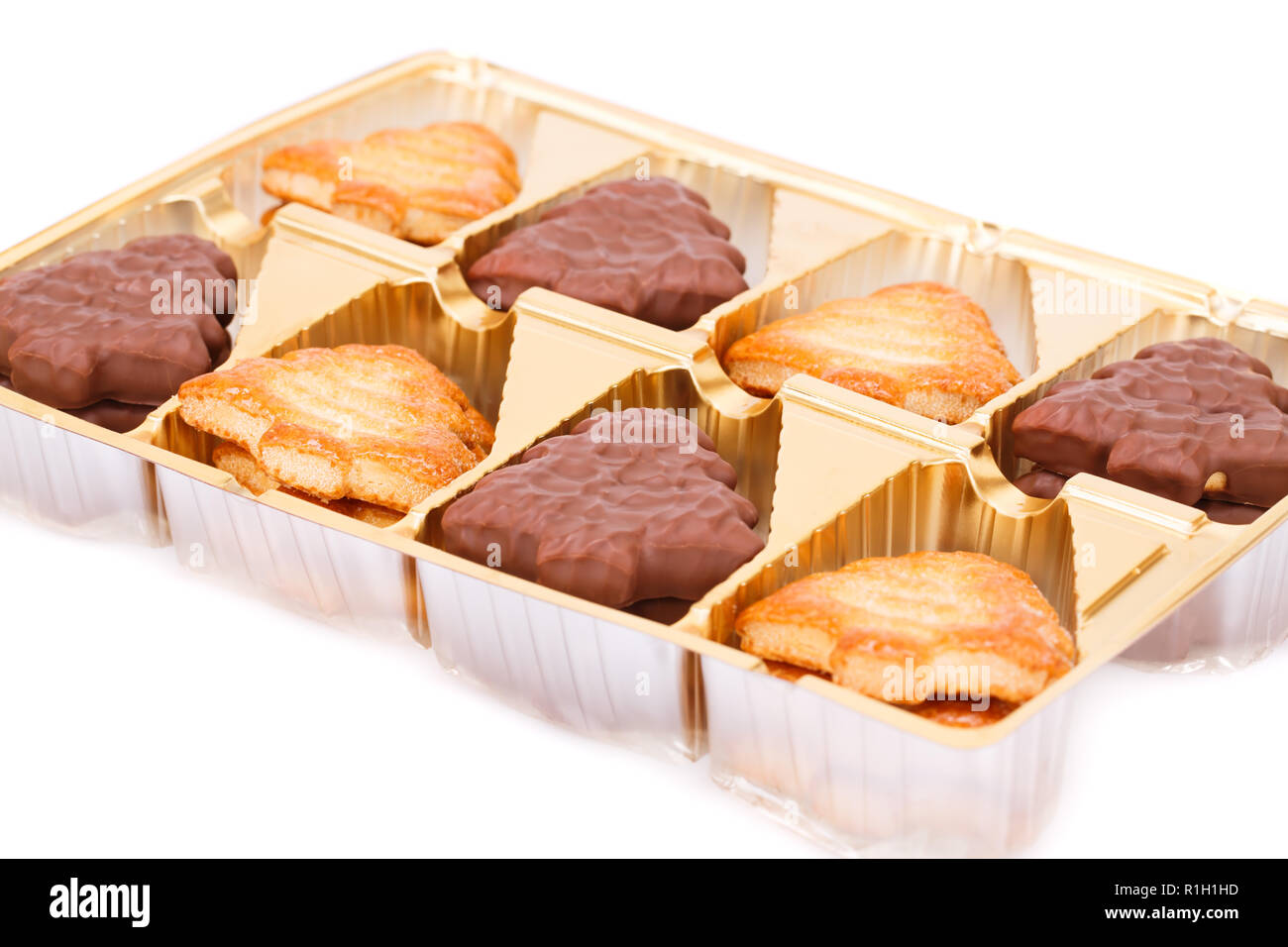 Cookies in plastic box on white background Stock Photo - Alamy