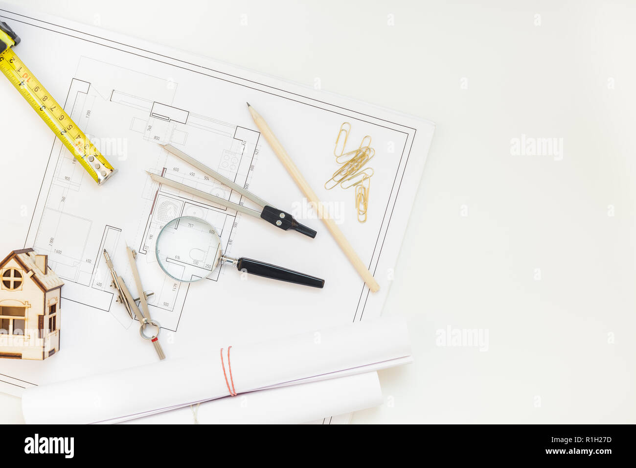 Creative flat lay overhead top view blueprints architectural flat ...