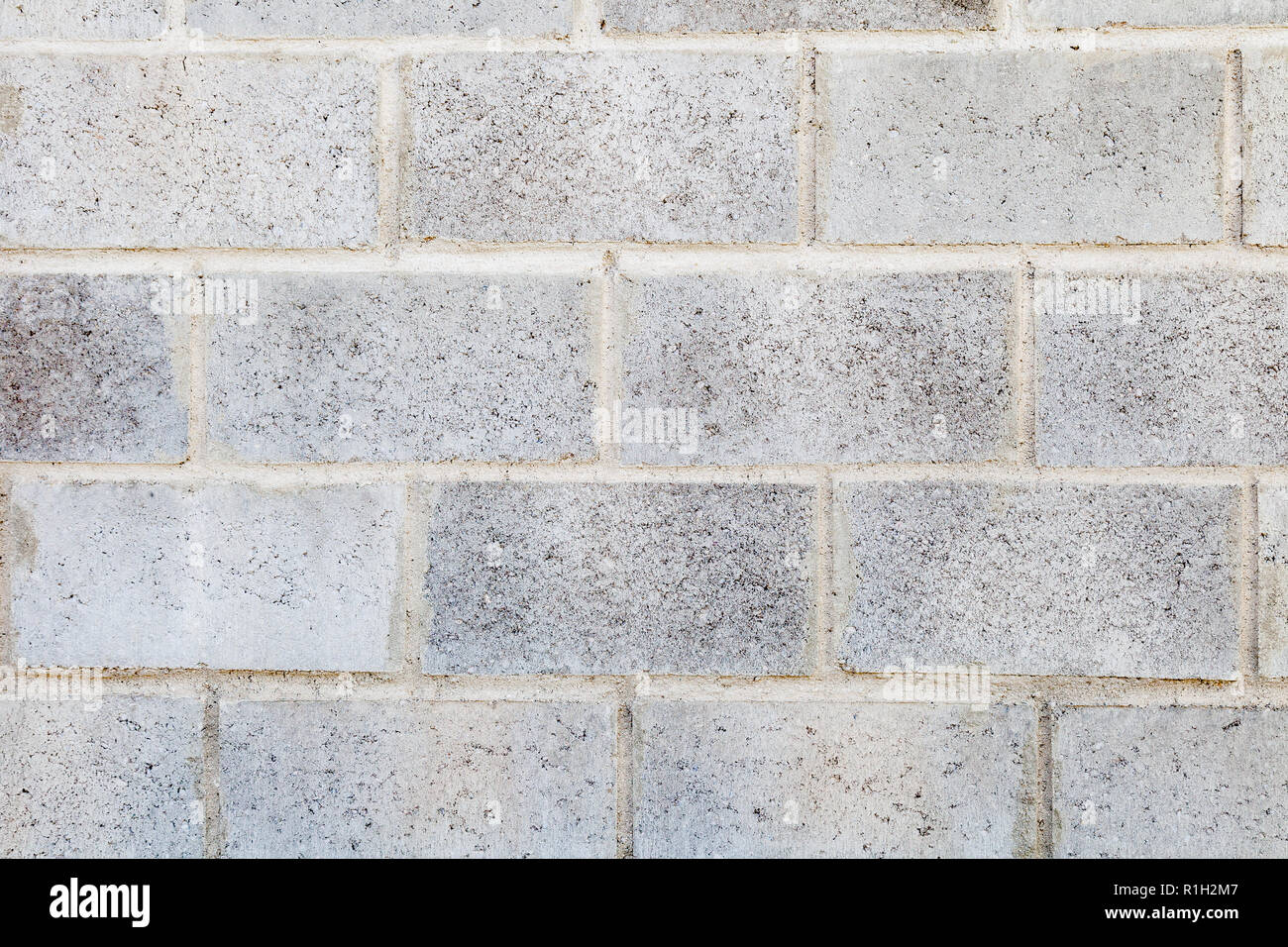 Old concrete blocks wall texture background Stock Photo - Alamy