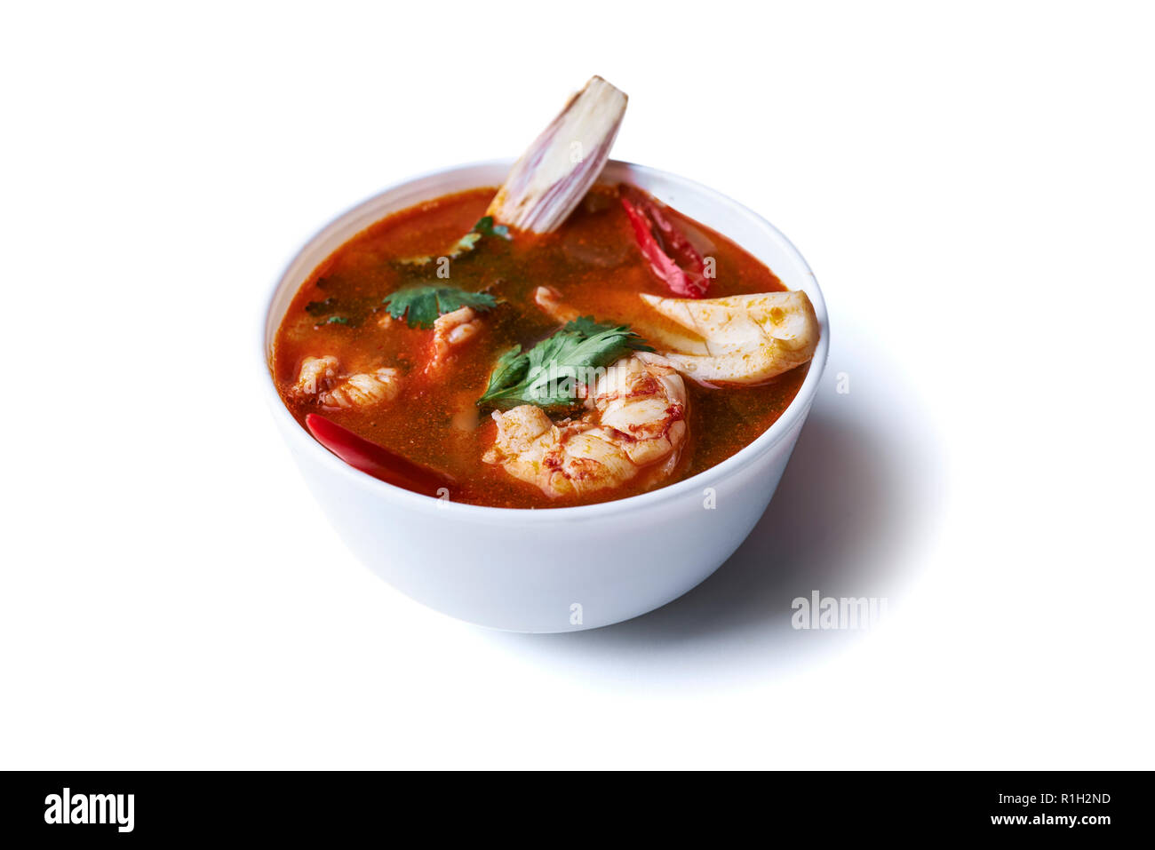tom yum. spicy thai soup isolated on white background Stock Photo - Alamy