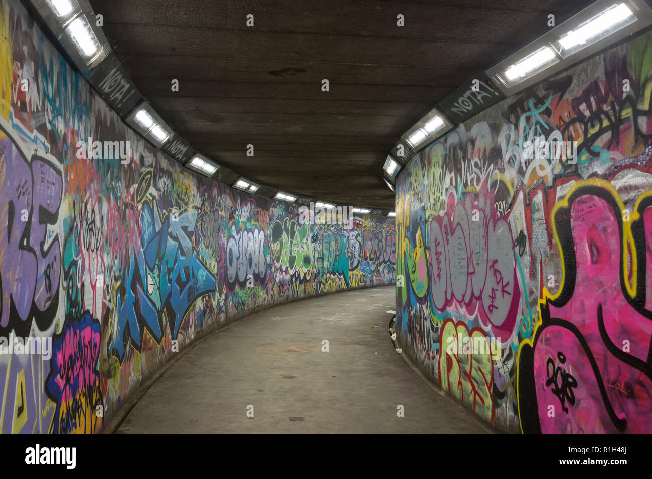 Graffiti in Belfast underpass Stock Photo - Alamy