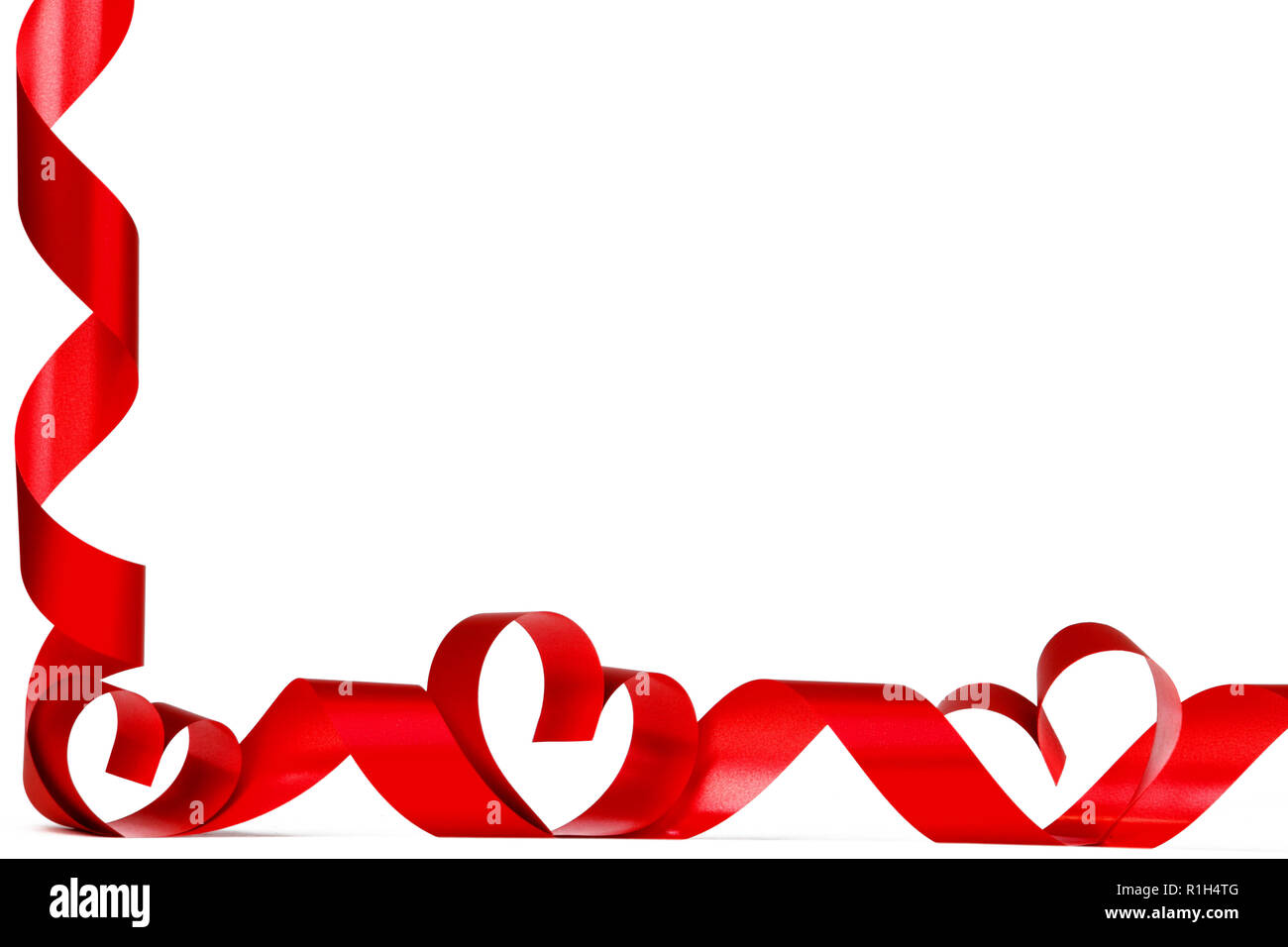 Red heart ribbon bow isolated on white background Stock Photo - Alamy