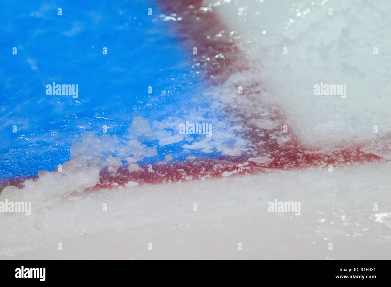 Red goal line on ice hockey rink. Winter sport Stock Photo - Alamy