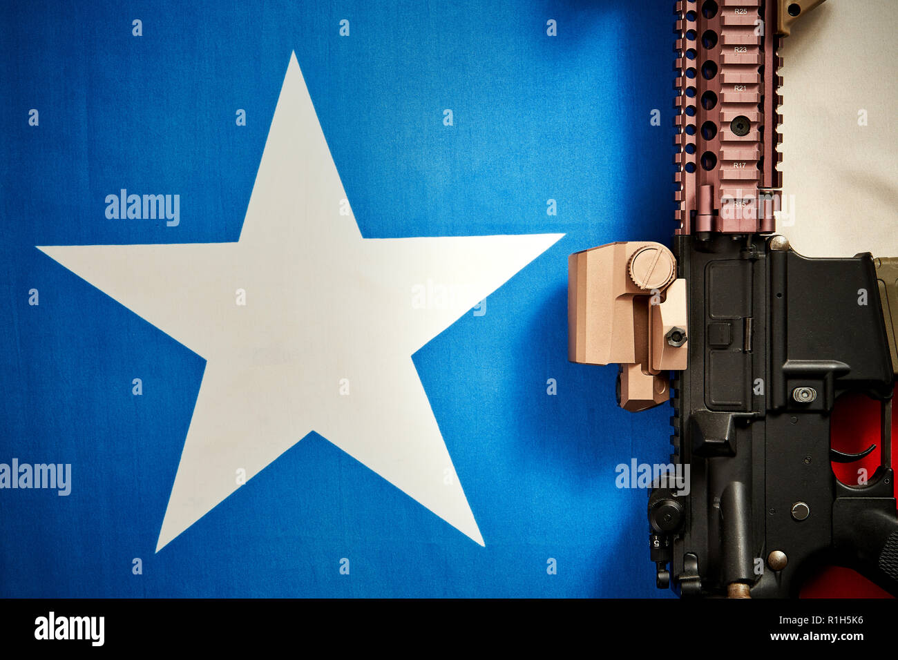 top view of a machine gun that is located on the background of the ...