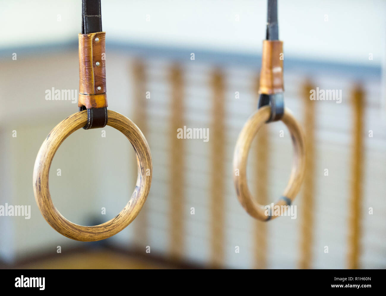 Gymnastic ring hanging in gym. healthy lifestyle and fitness concept ...