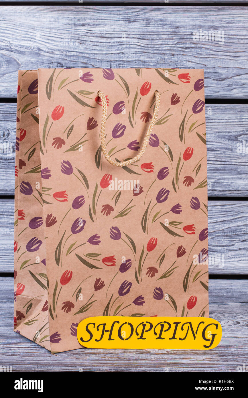 Paper shopping bag with a floral design Stock Photo - Alamy