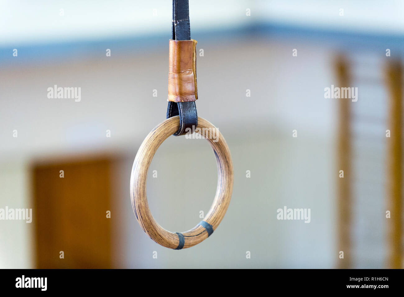Gymnastic ring hanging in gym. healthy lifestyle and fitness concept ...