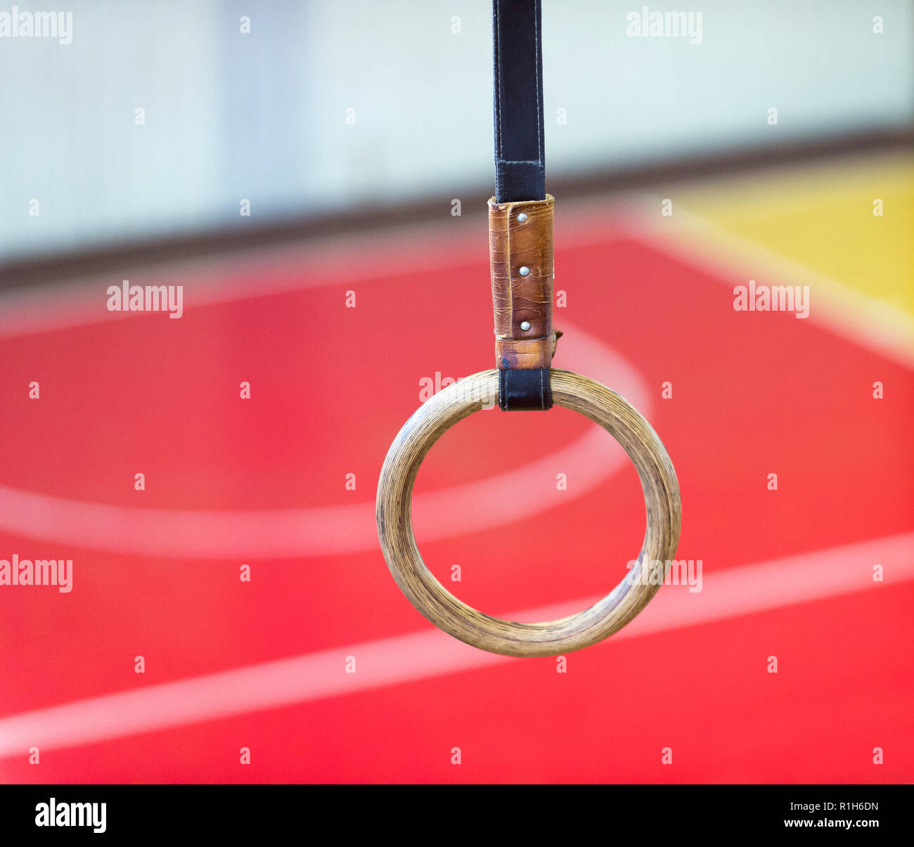 Gymnastic ring hanging in gym. healthy lifestyle and fitness concept ...